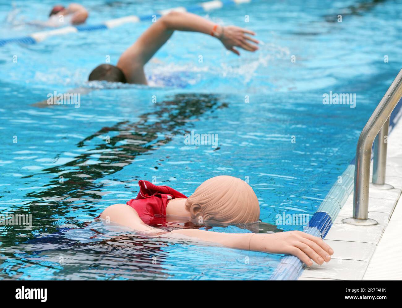 14 June 2023, Berlin: A special mannequin lies in the pool at the ...