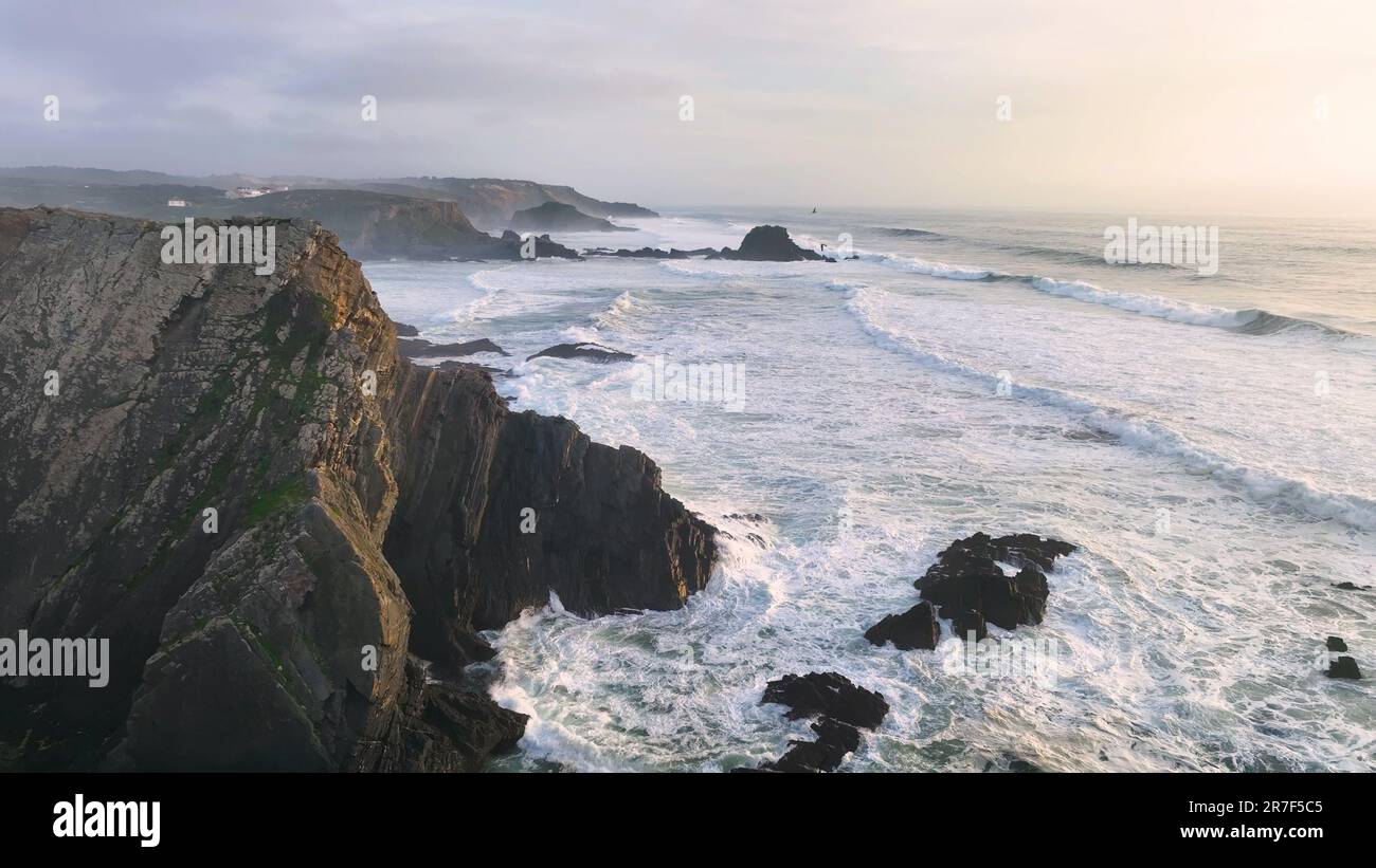 Aerial footage of the cliffs and beach in Portugal. Rota Vicentina ...