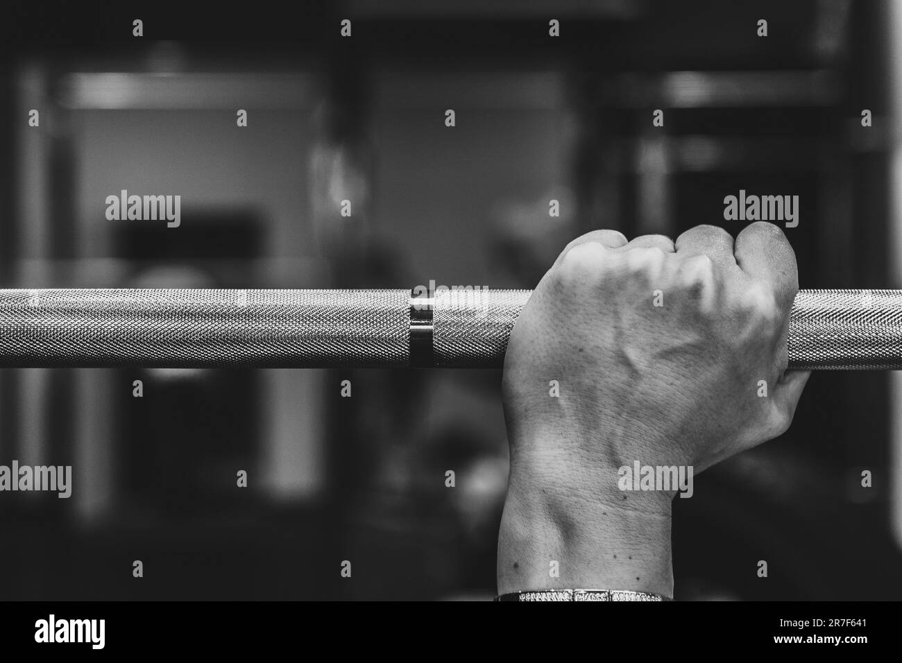 A fit and healthy man exercising in a gym Stock Photo - Alamy