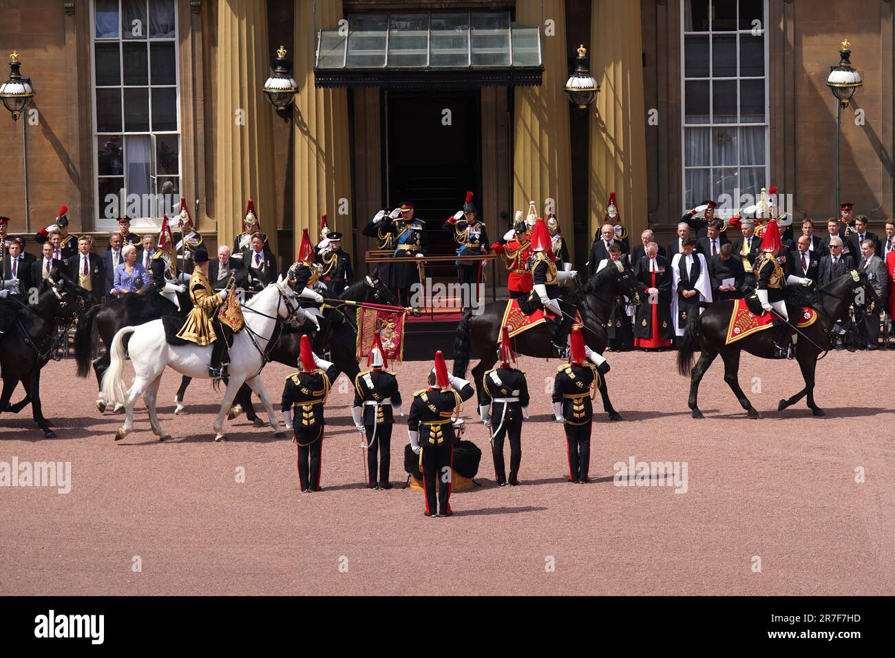 King Charles III, accompanied by the Princess Royal, presents the new ...