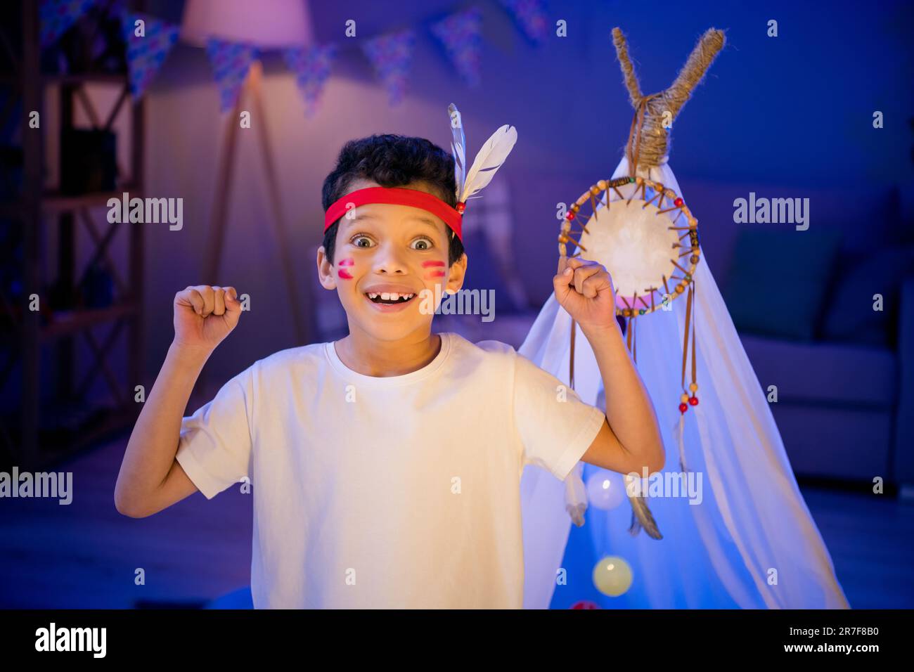Photo of surprised positive boy celebrate his birthday in native ...