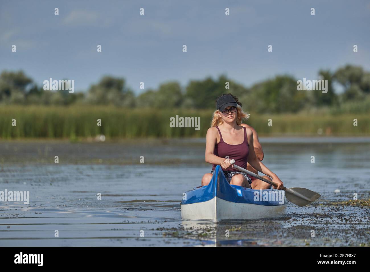 Canoeing in a river natural environment Stock Photo - Alamy