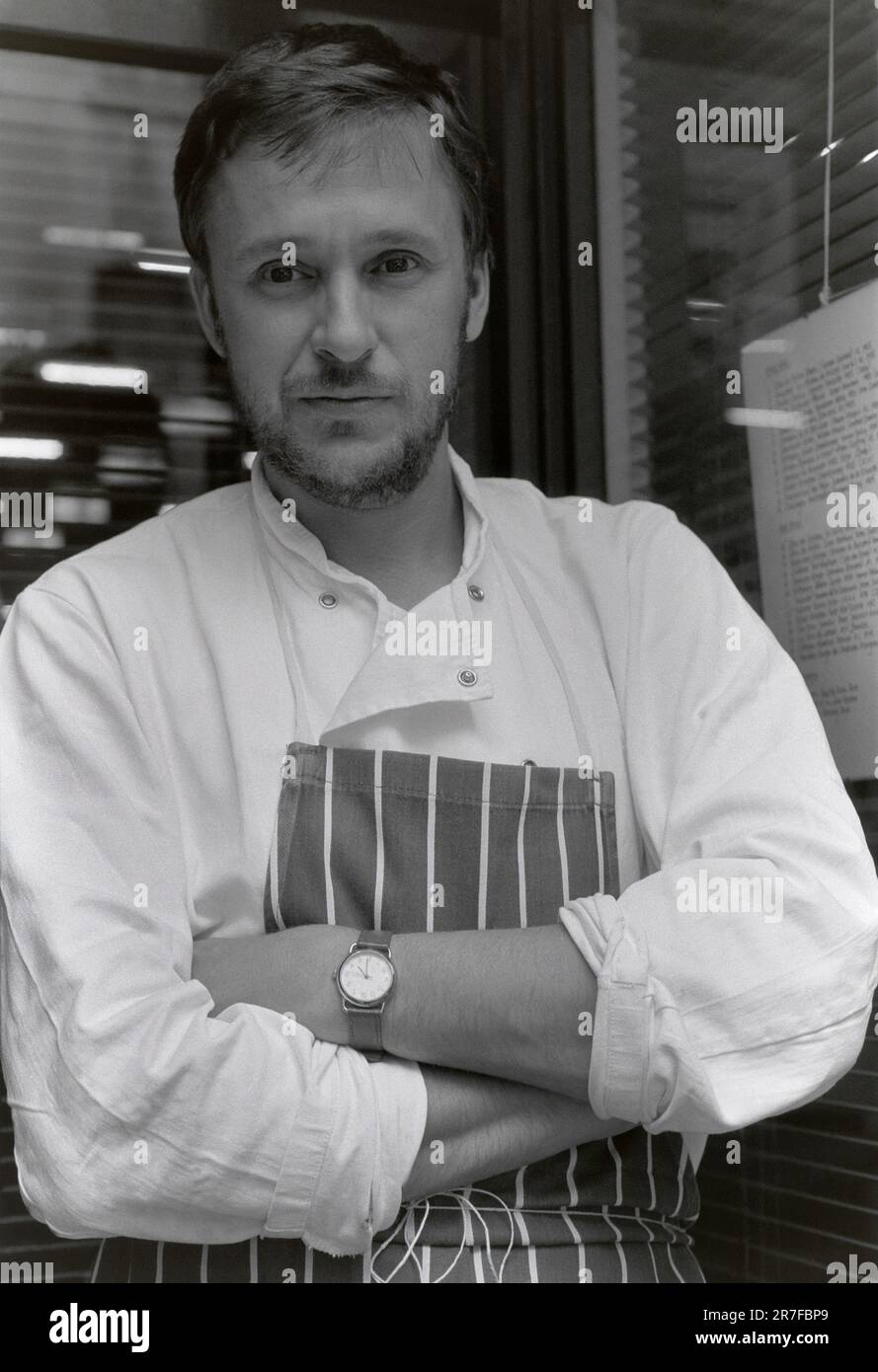 Alastair Little, chef, standing outside his restaurant in Frith Street ...