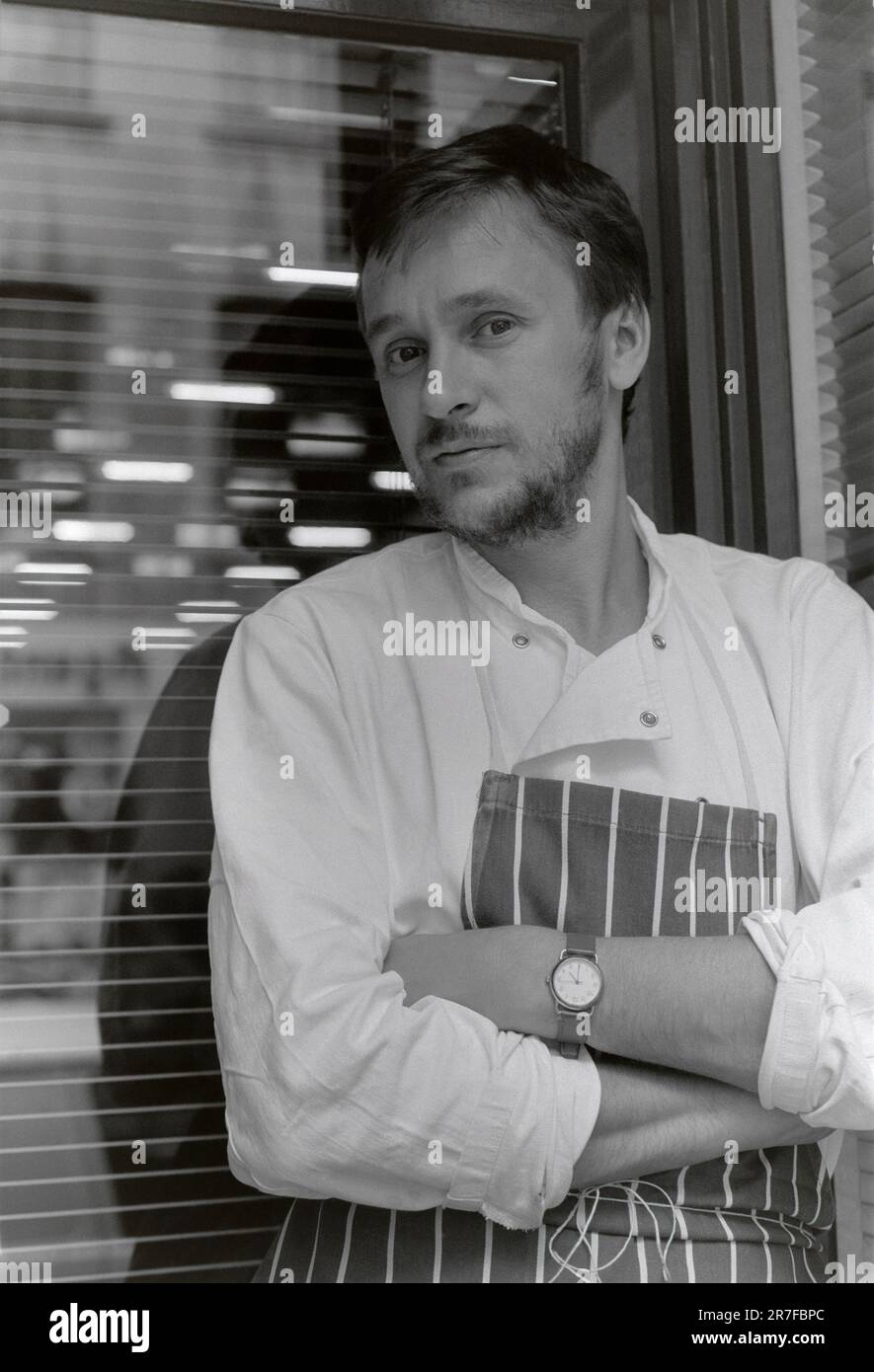 Alastair Little, chef, standing outside his restaurant in Frith Street ...
