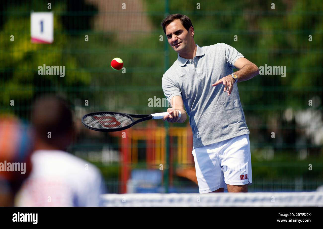 Roger Federer during a coaching session with local school children at ...