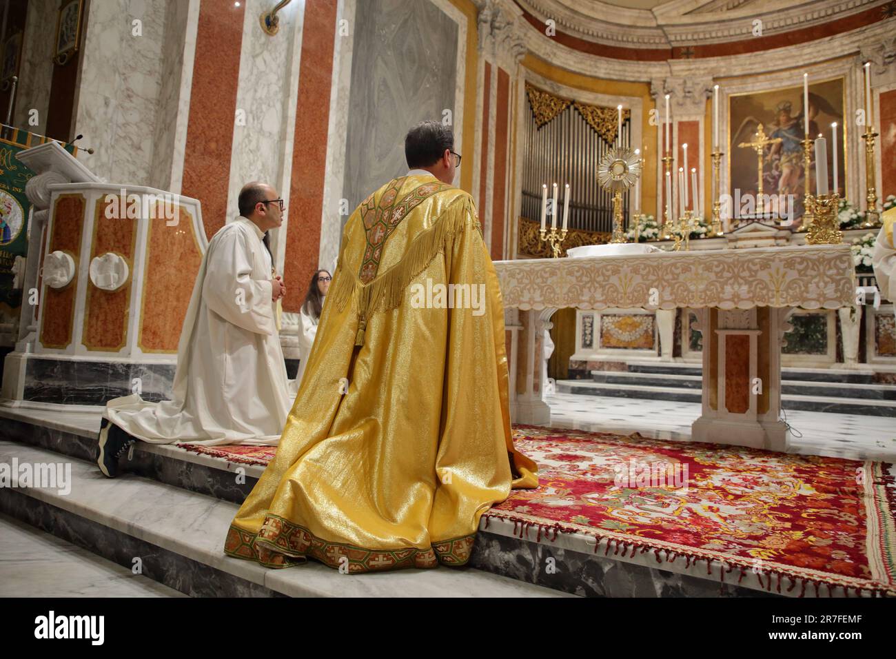 Procession through the streets of the Historic Center of priests, nuns ...