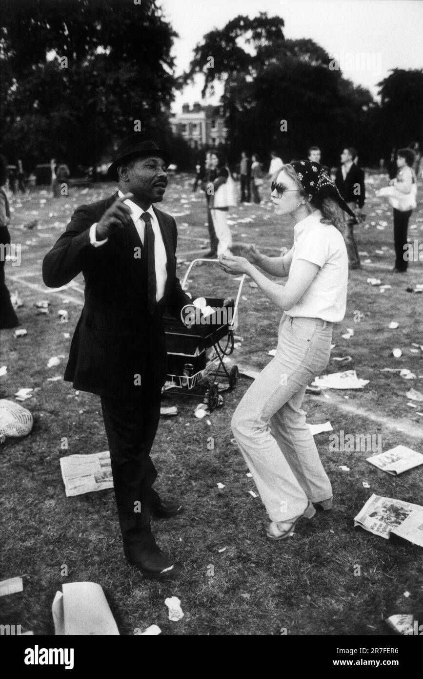 rock-against-racism-1970s-uk-a-mixed-race-couple-dancing-together-in