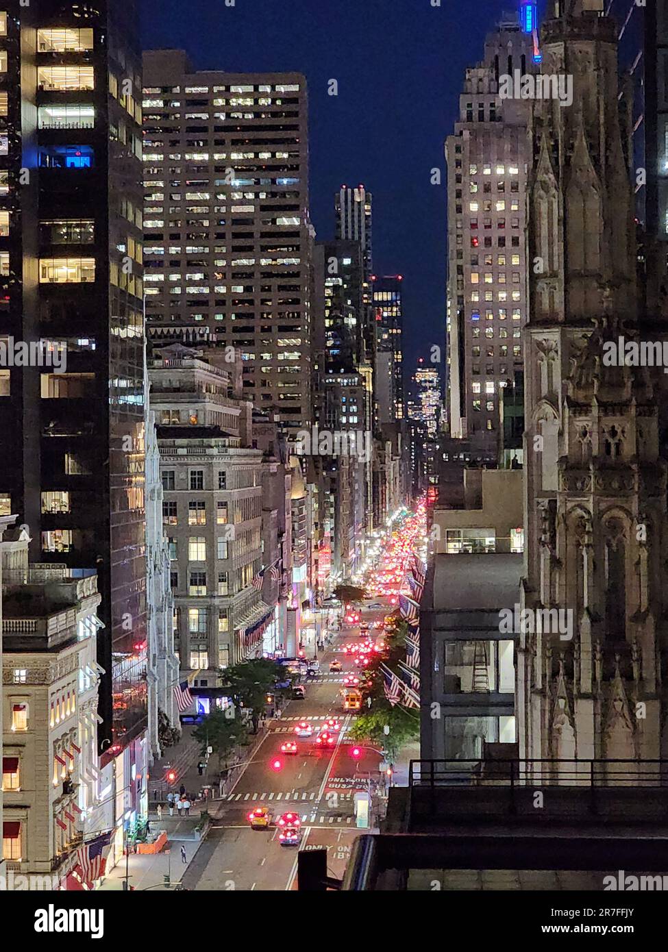 New York City Fifth Avenue at night looking south from 54th Street ...