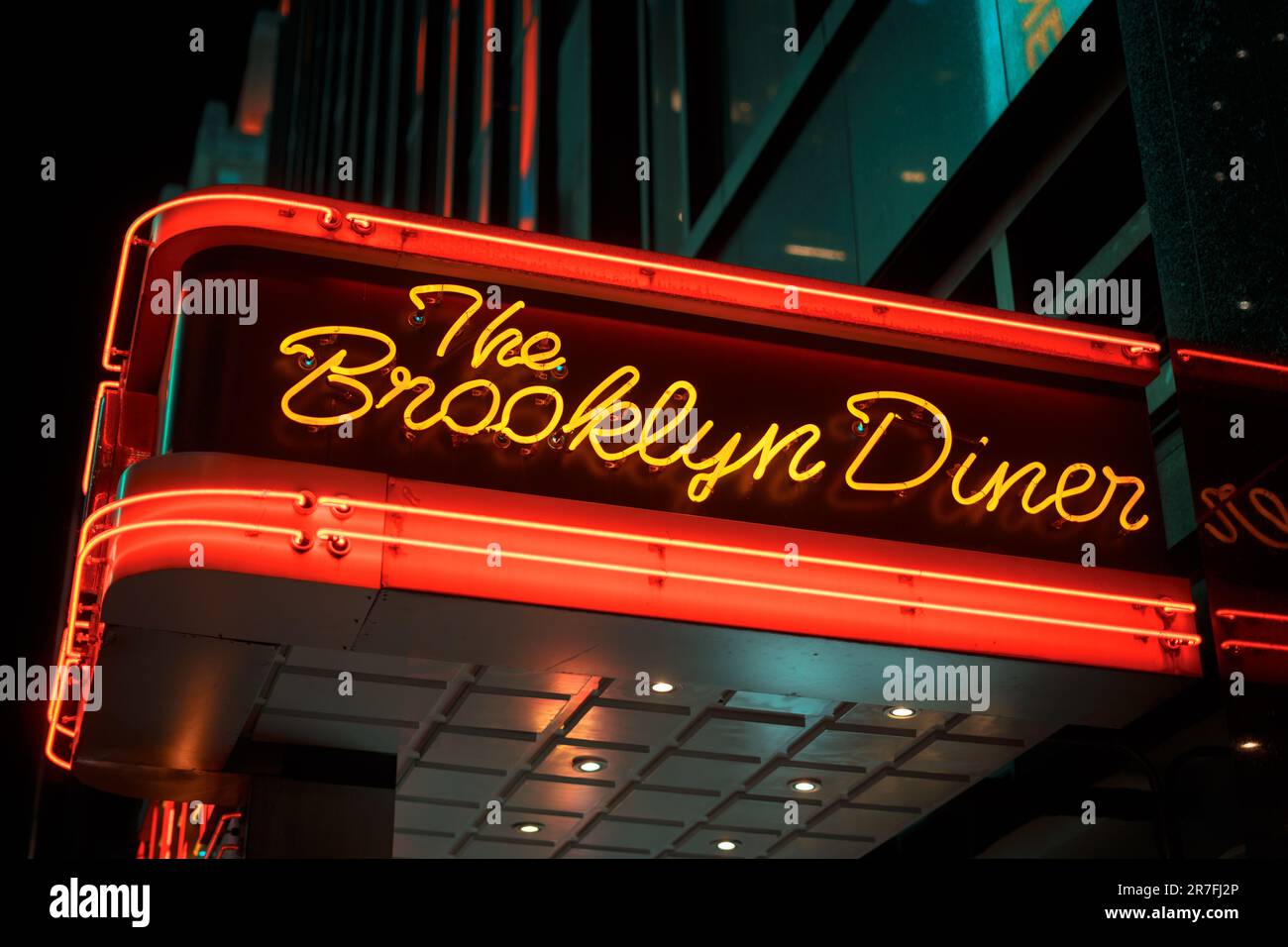 Brooklyn Diner neon sign at night in Times Square, Manhattan, New York ...