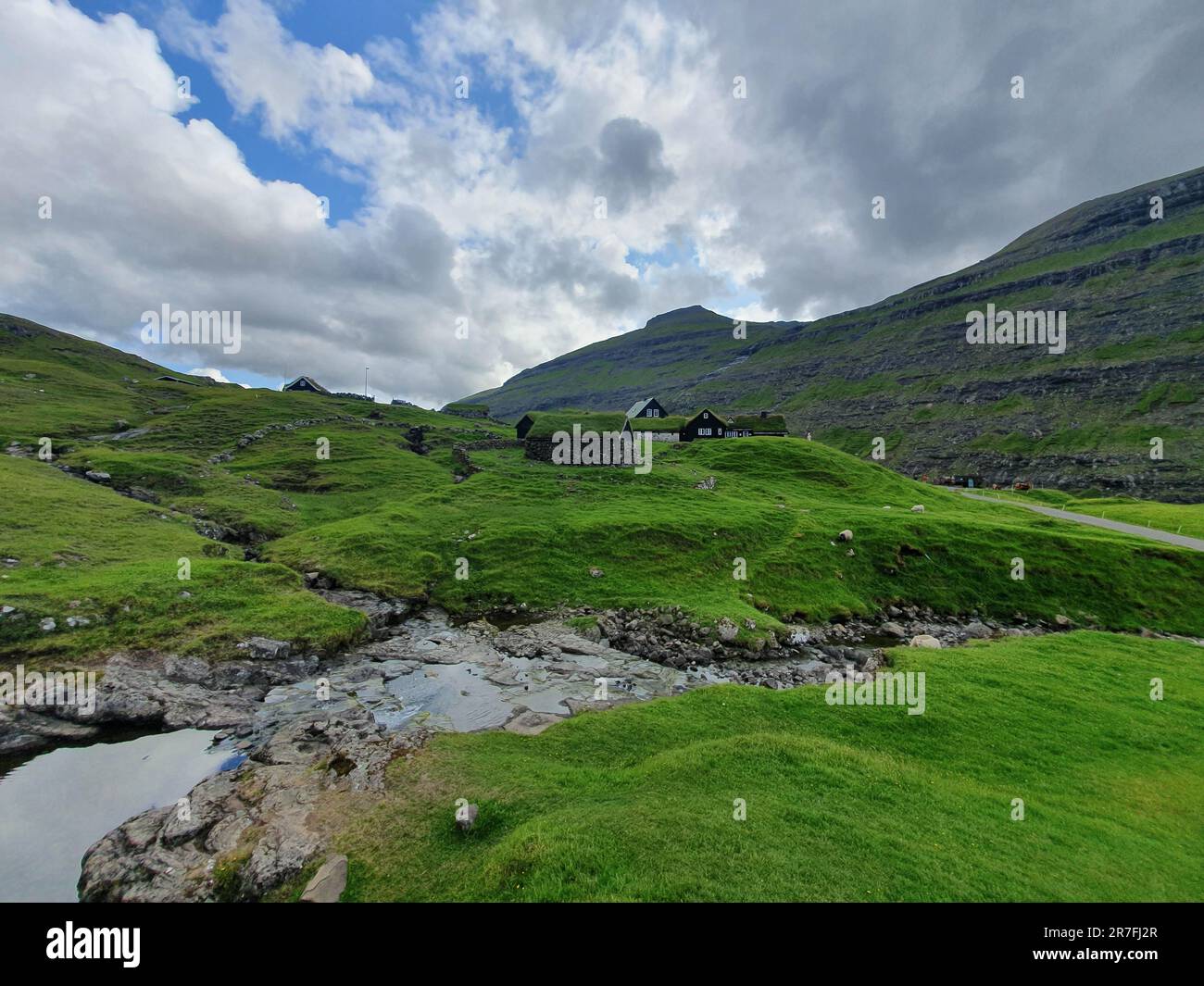A breathtaking aerial shot of the Faroe Islands showcasing its dramatic ...