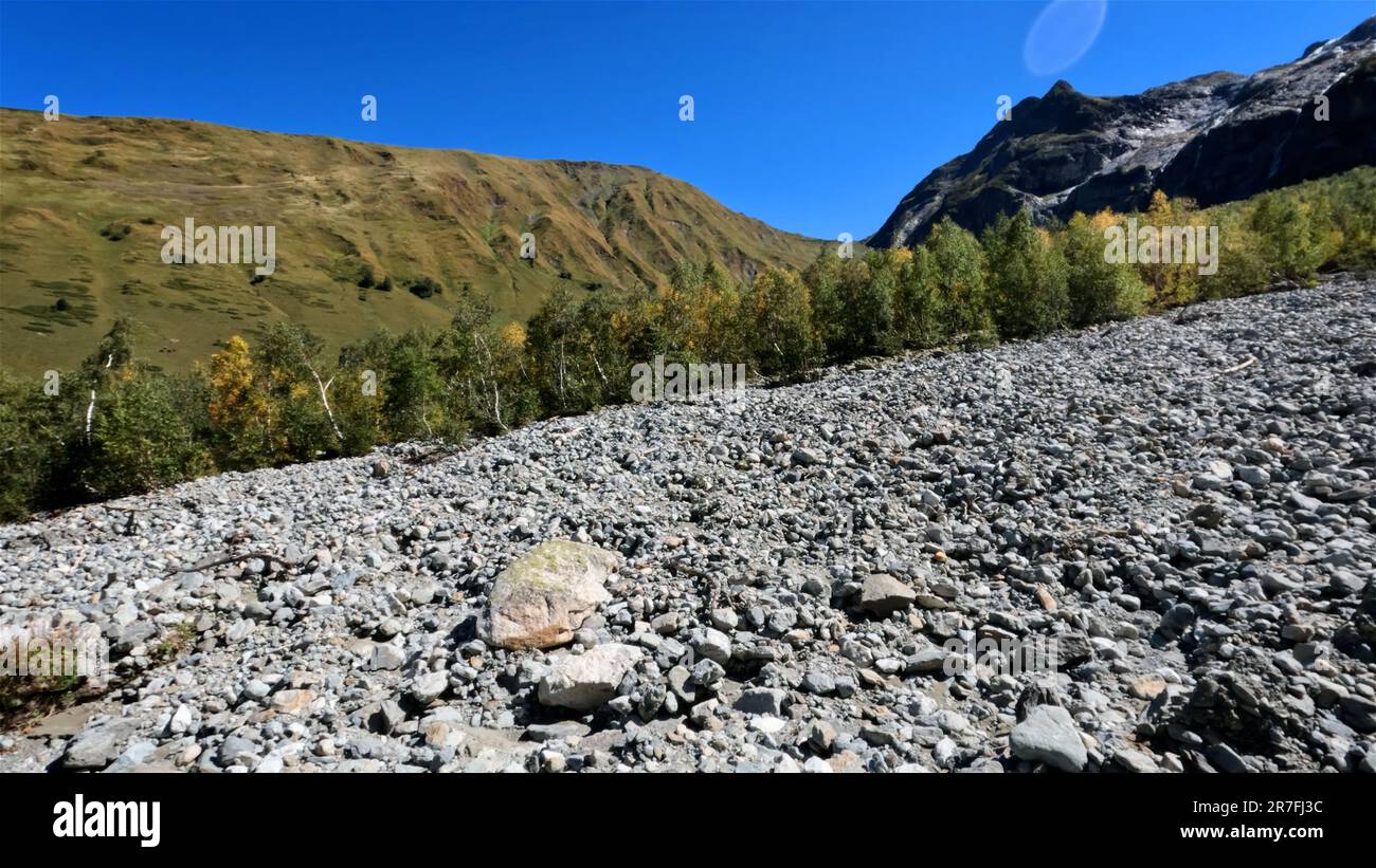 mountain ridge rough touristic ground road with no bitumen cover ...