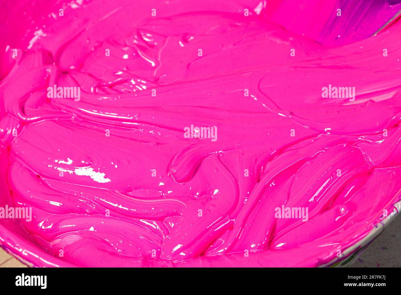 .mixing a new pink color I'm using red, purple, .orange and a bit of ...