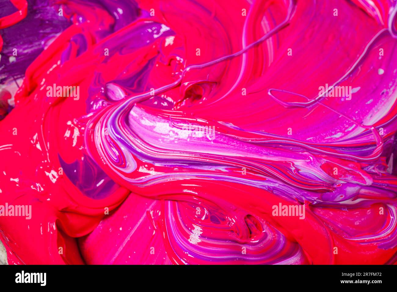 .mixing a new pink color I'm using red, purple, .orange and a bit of ...