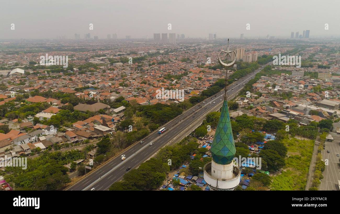 aerial view cityscape city Surabaya with mosque Al Akbar, highway ...
