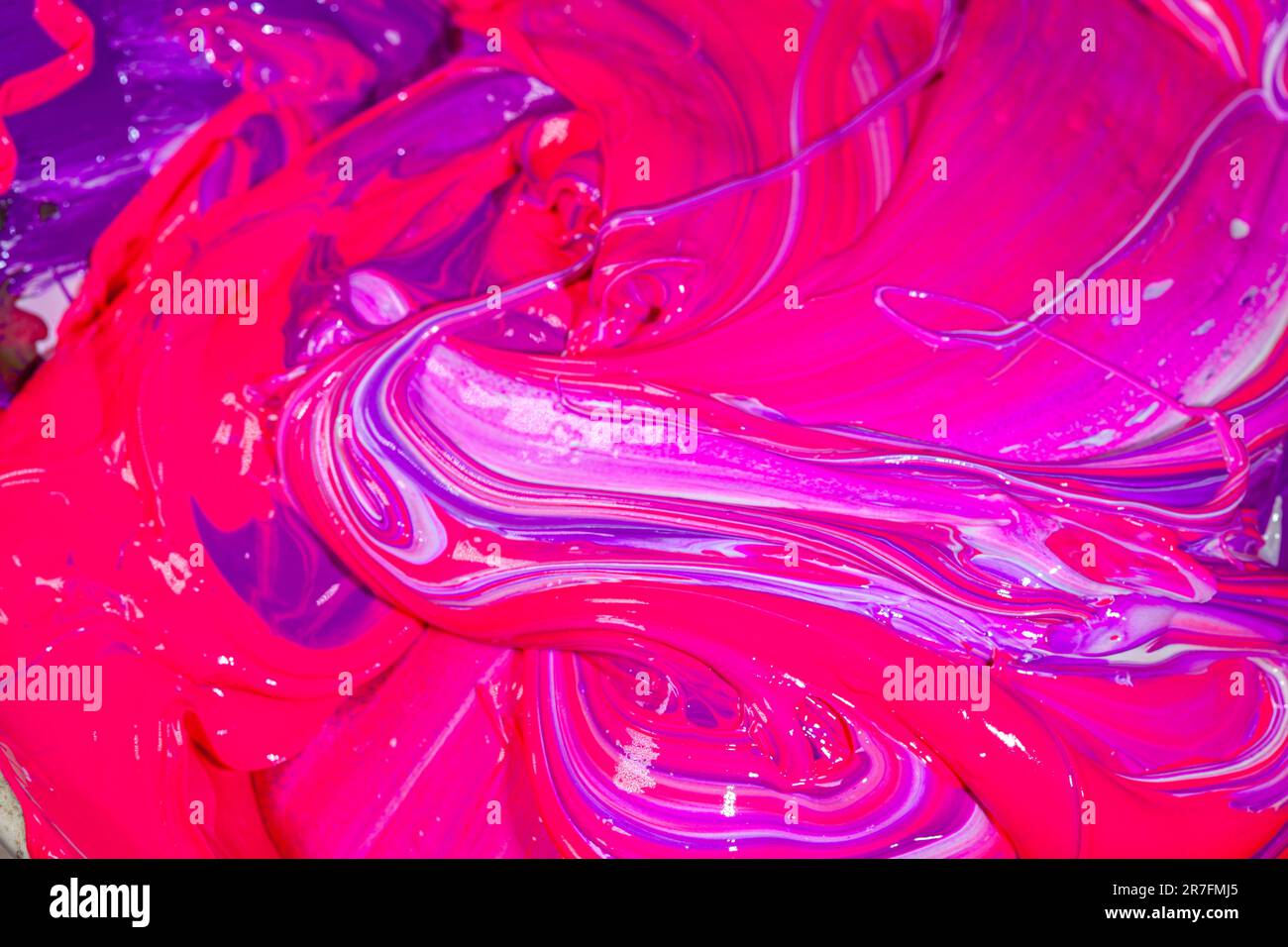 .mixing a new pink color I'm using red, purple, .orange and a bit of ...