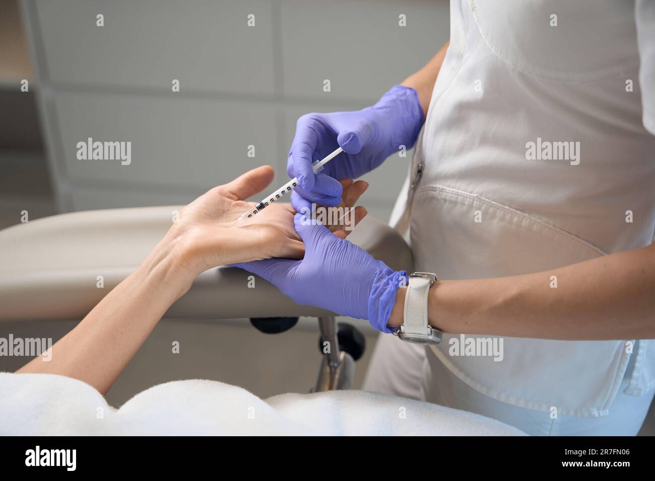Closeup of doctor hands in gloves making palm injection Stock Photo - Alamy