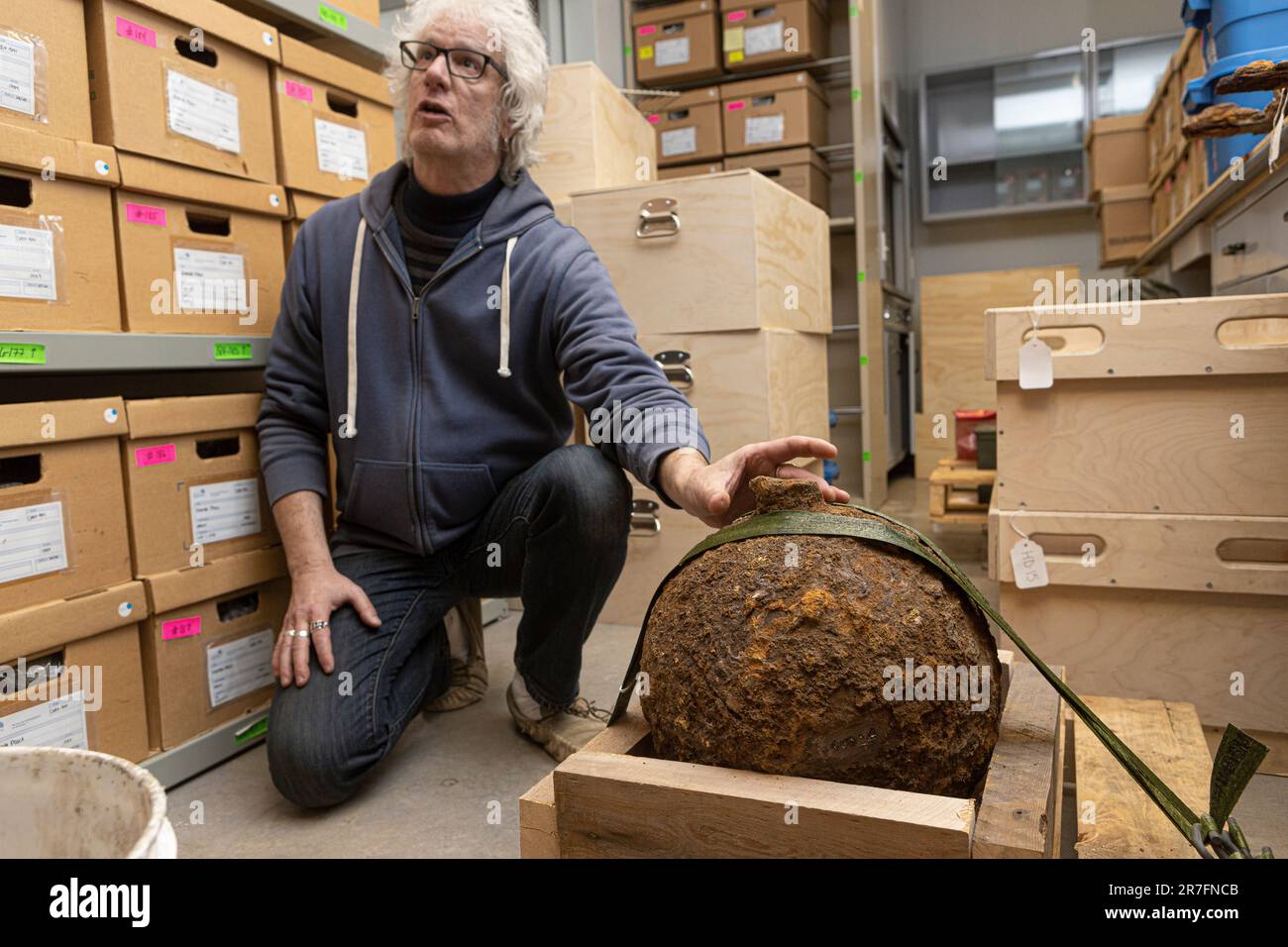 Paul-Gaston L'Anglais showcases the details of a French bomb, likely ...