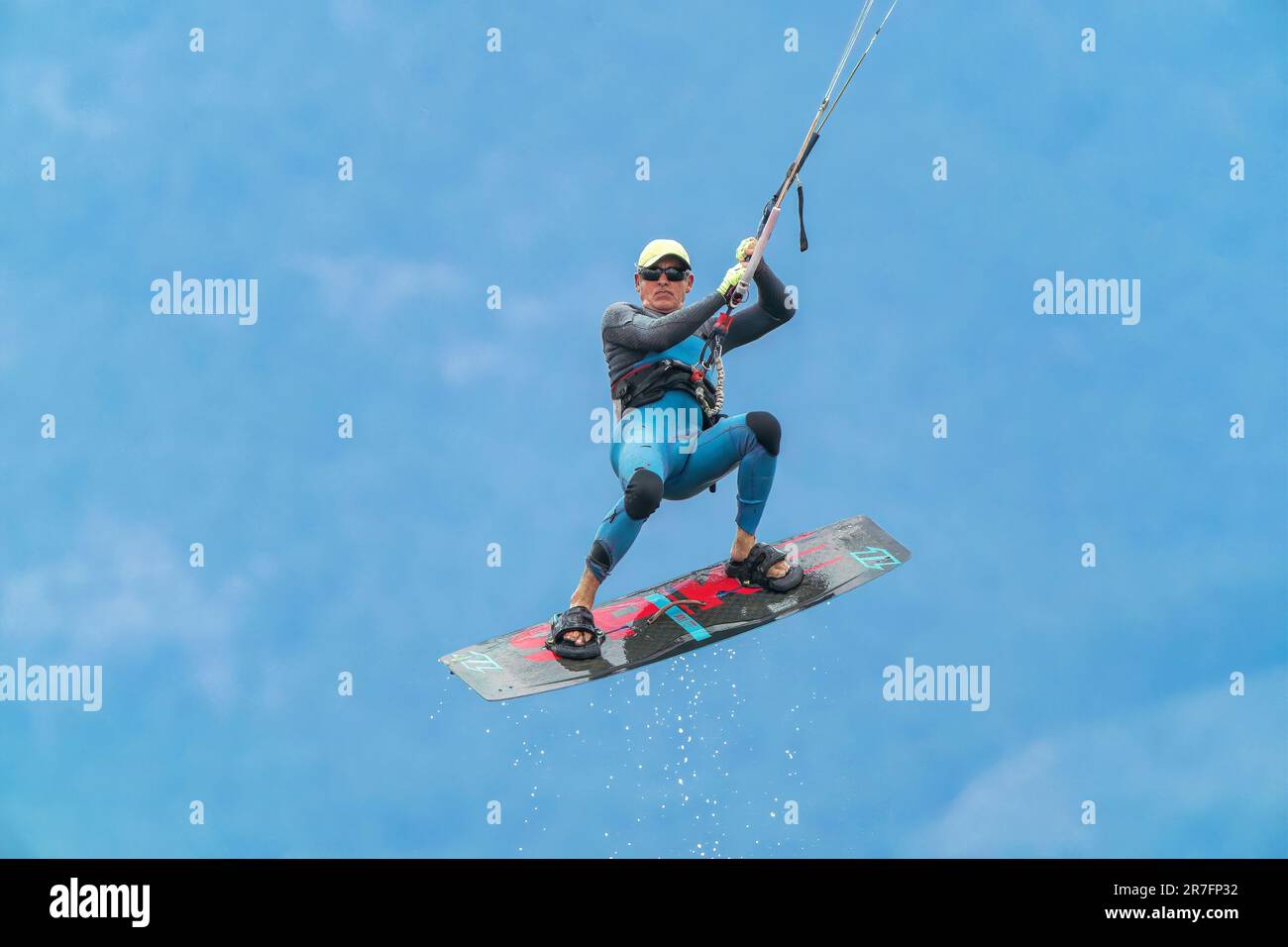 kite surfer in action, airborne over the sea, Mallorca, Spain Stock ...