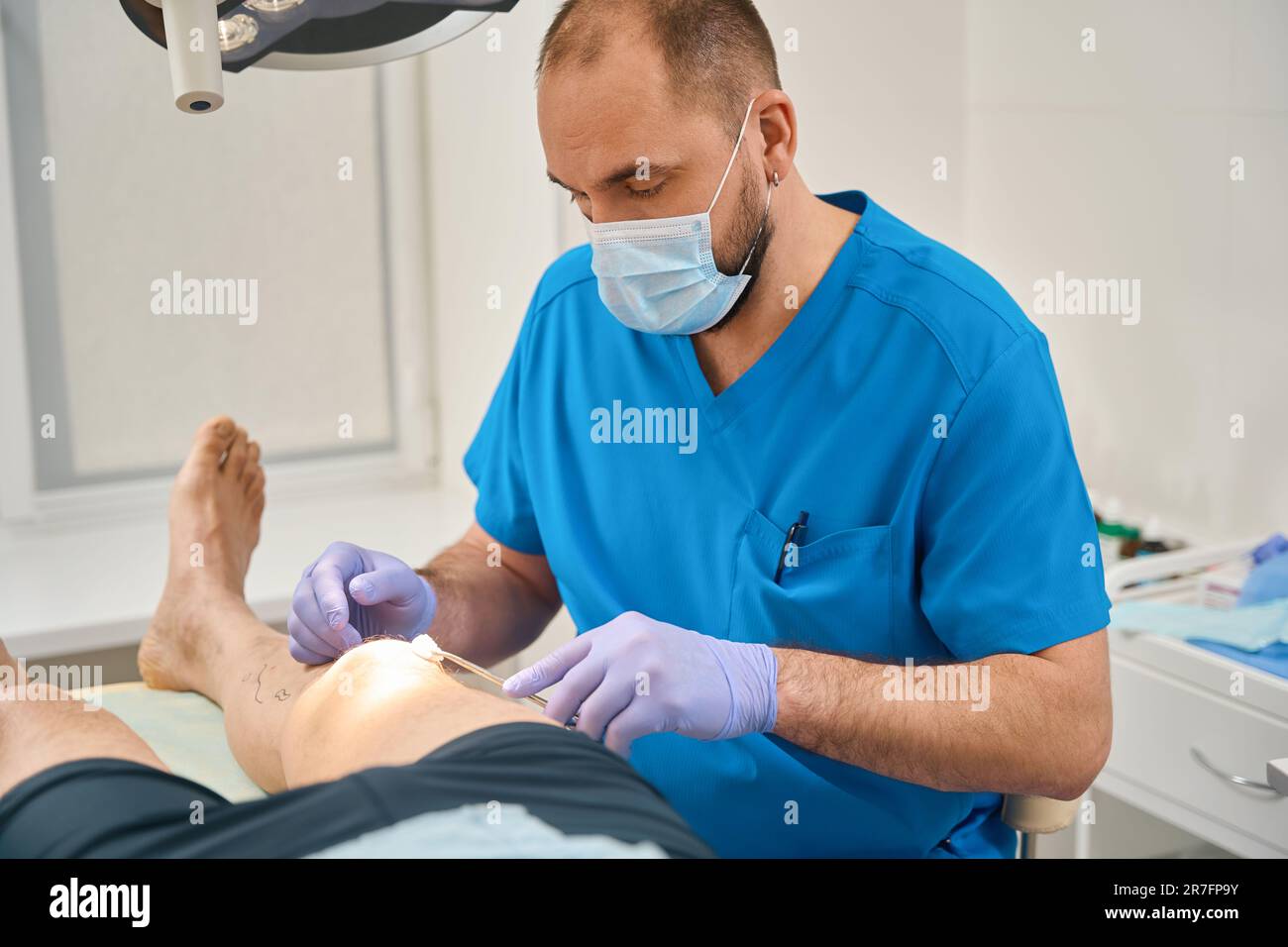 Swabs operating hi-res stock photography and images - Alamy