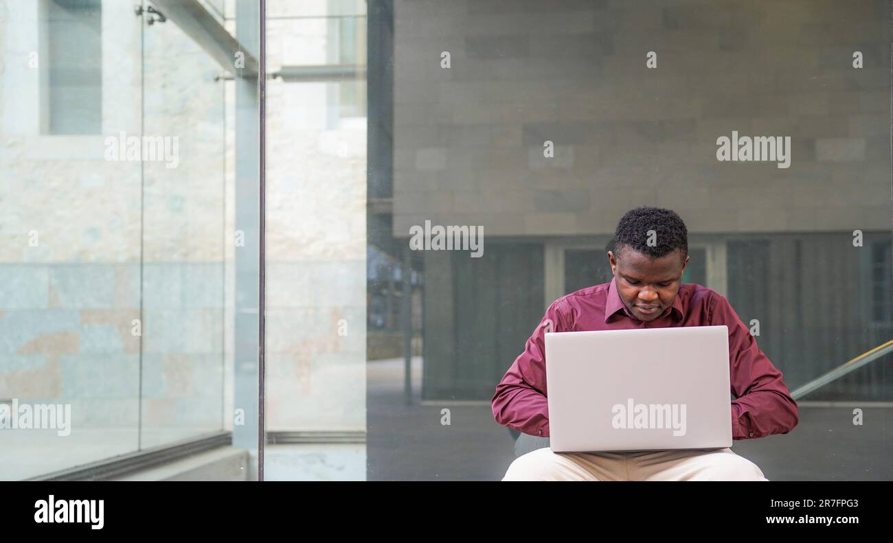 Authentic black man computer hi-res stock photography and images - Alamy