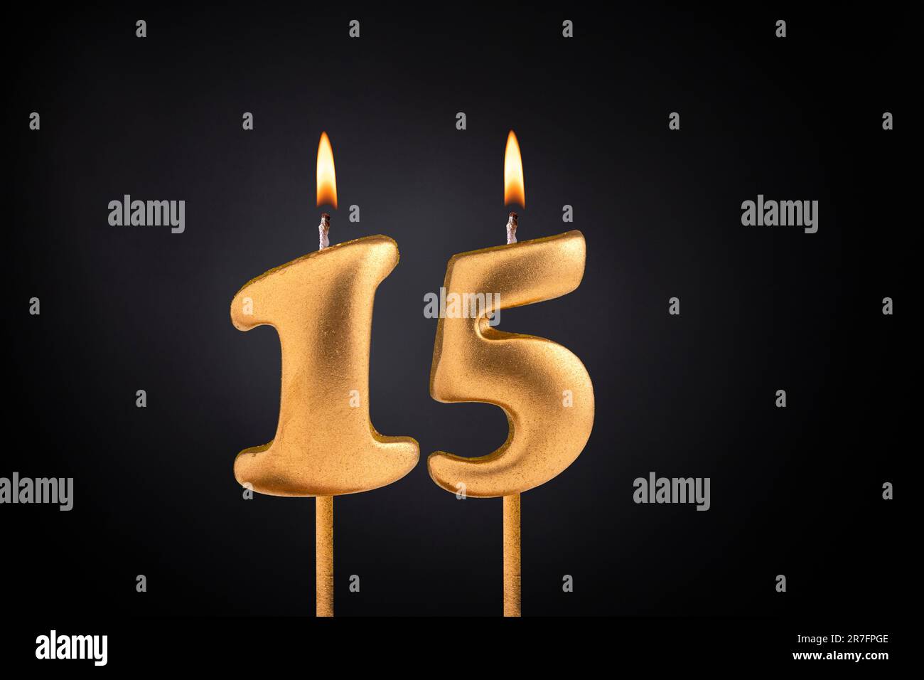 Golden candle 15 with flame - Birthday card on dark luxury background ...