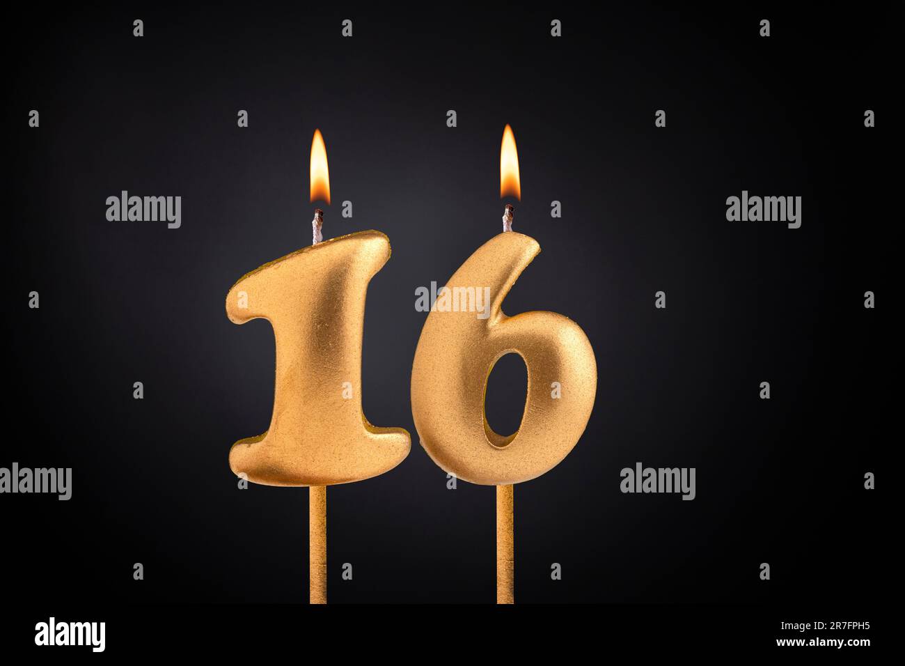 Birthday candle number 16 - Birthday celebration on black background ...
