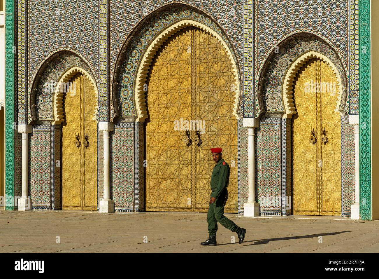 Morocco. Fez. A soldier of the royal guard in front the royal palace ...