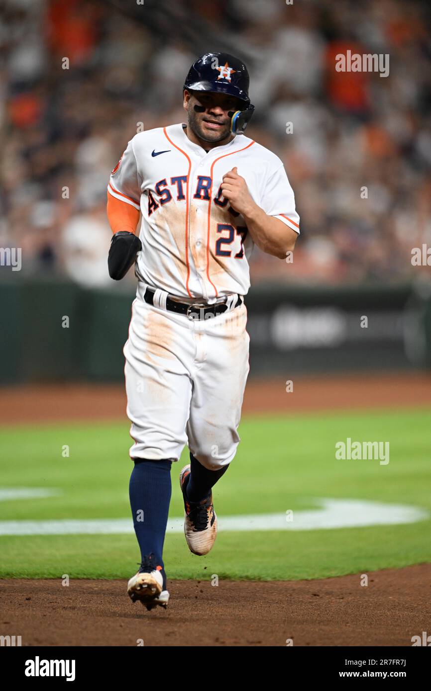 Houston Astros second baseman Jose Altuve (27) scores his 1000th run in the bottom of the ...