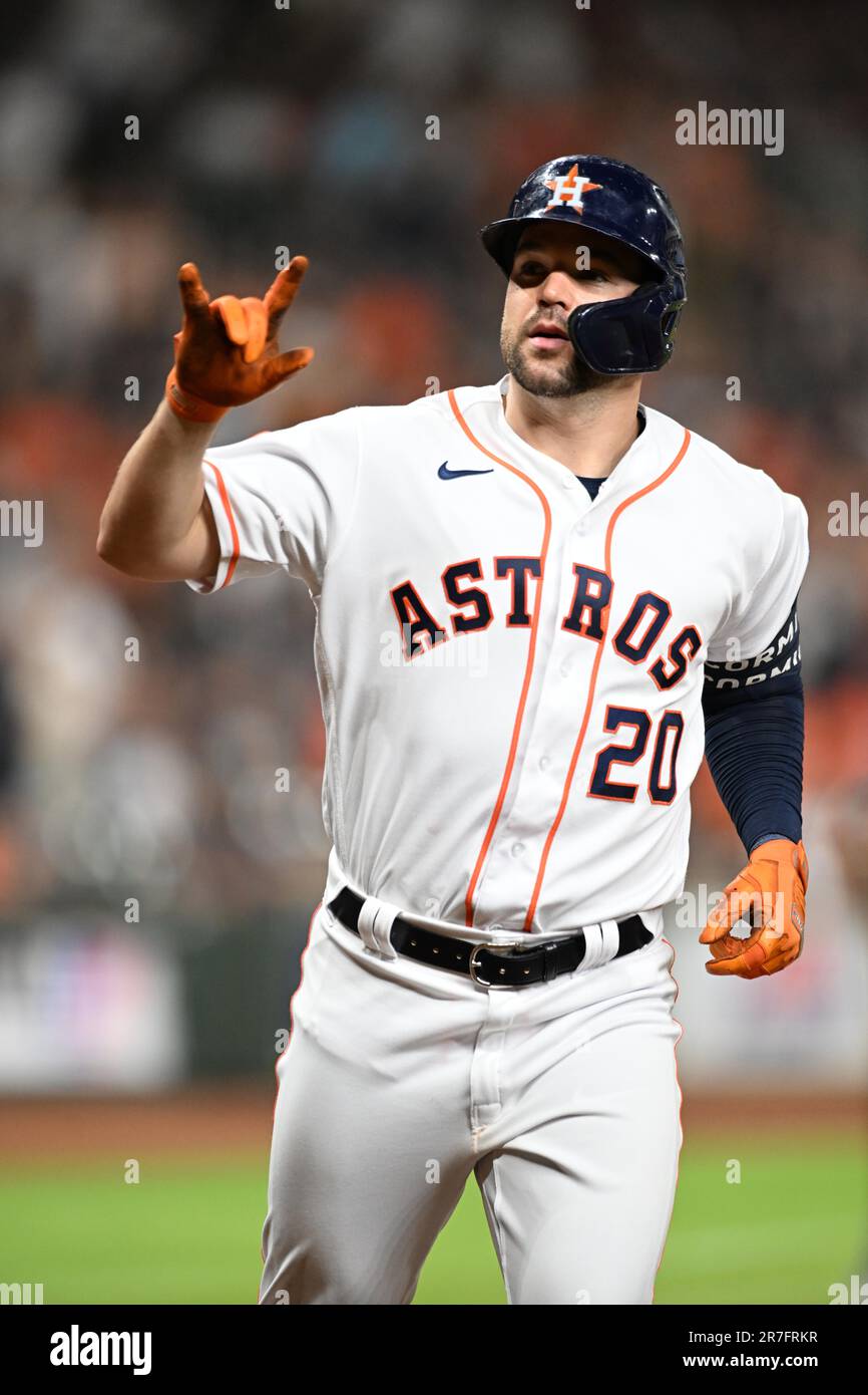 Houston Astros center fielder Chas McCormick (20) hits a solo 392-foot home run to left center ...