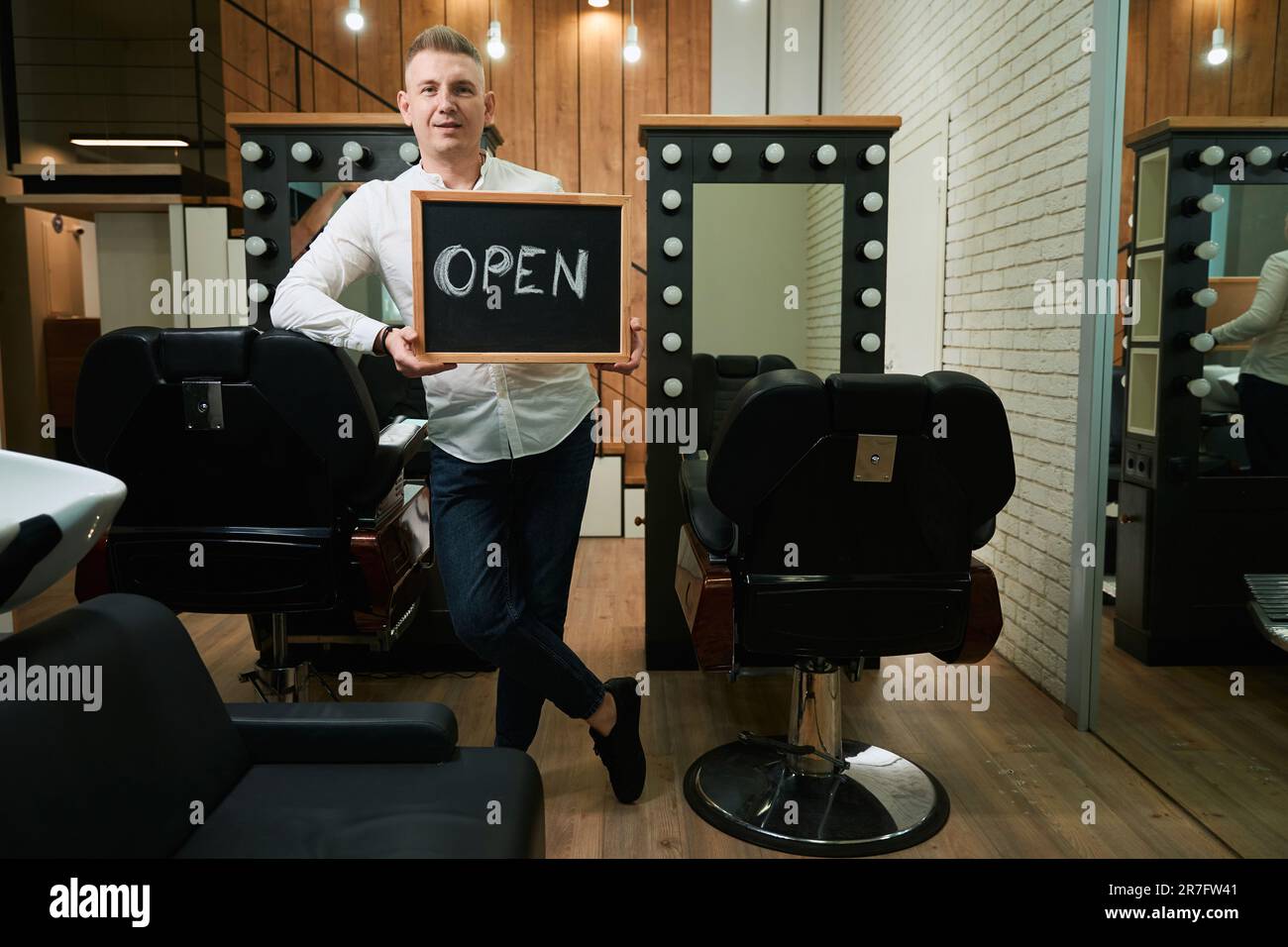 Barbershop interior man haircut mirrors hi-res stock photography and ...