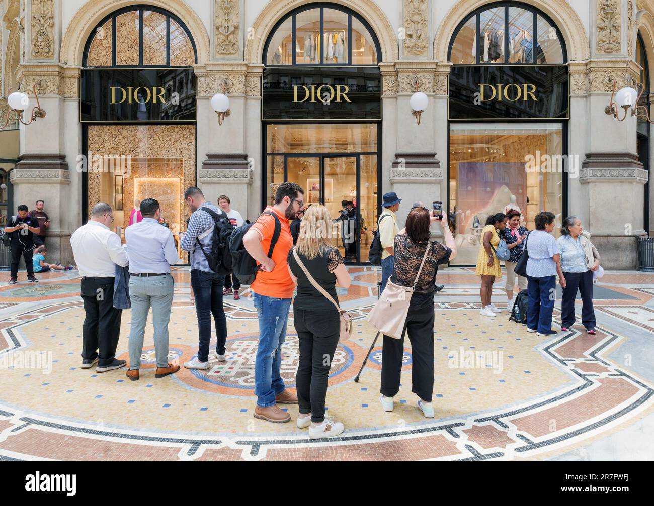 Dior shop in Galleria Vittorio Emanuele Milano, Italy. People entertain ...