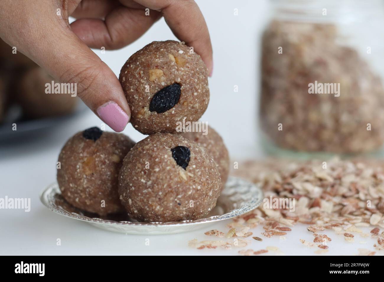 Rajamudi rice flakes laddu. Sweet balls made of roasted rajamudi rice ...