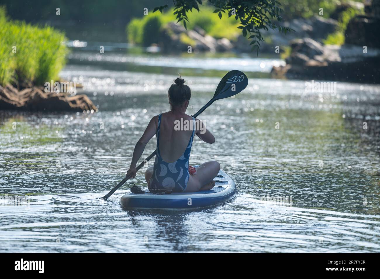 Woman paddle boarding uk hi-res stock photography and images - Alamy