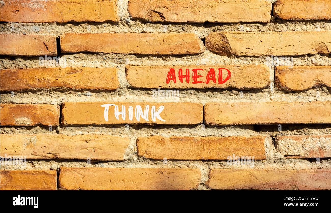 Think ahead symbol. Concept words Think ahead on beautiful brown bricks ...