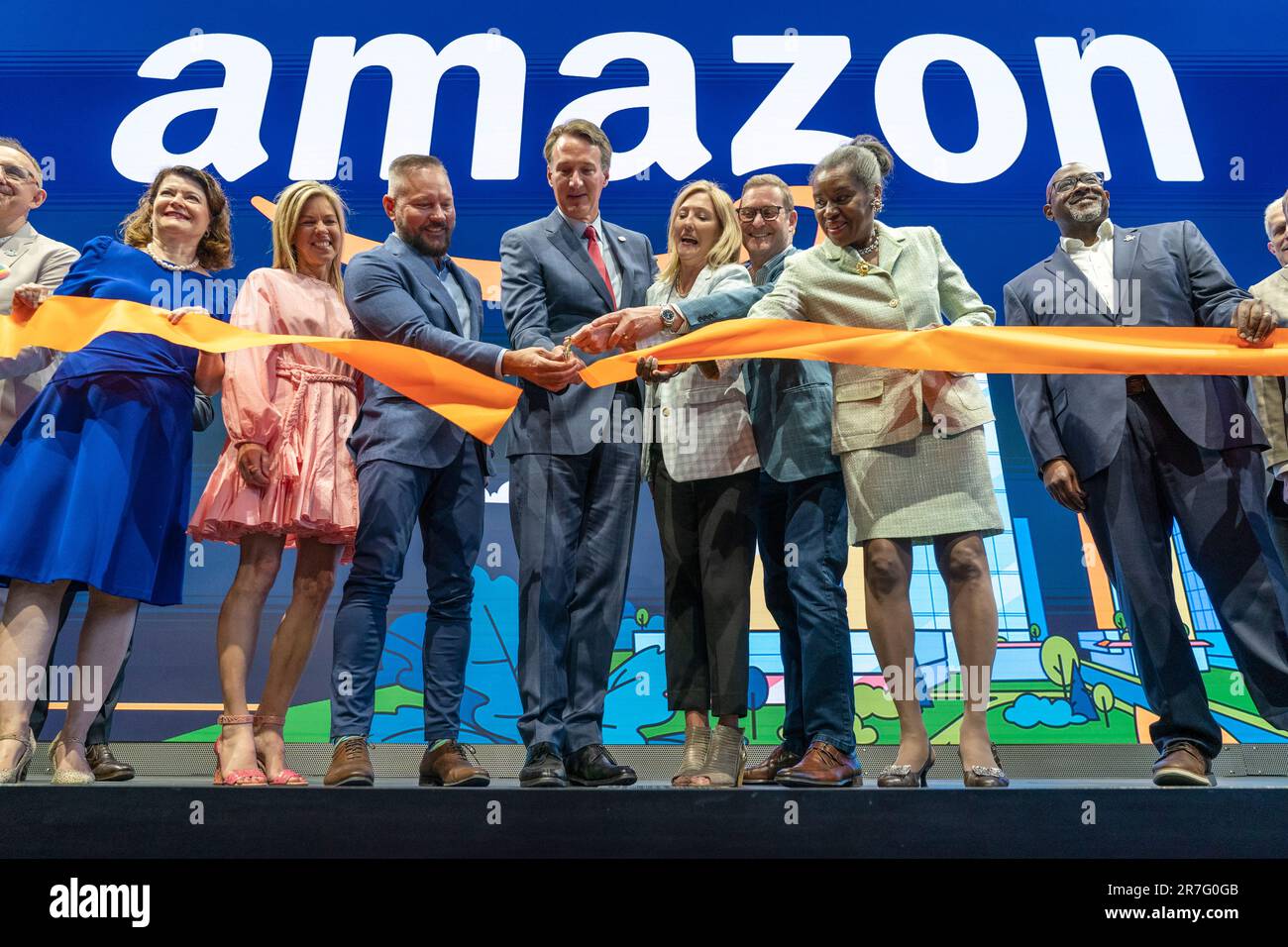 Virginia Gov. Glenn Youngkin, center, with Holly Sullivan, Vice ...