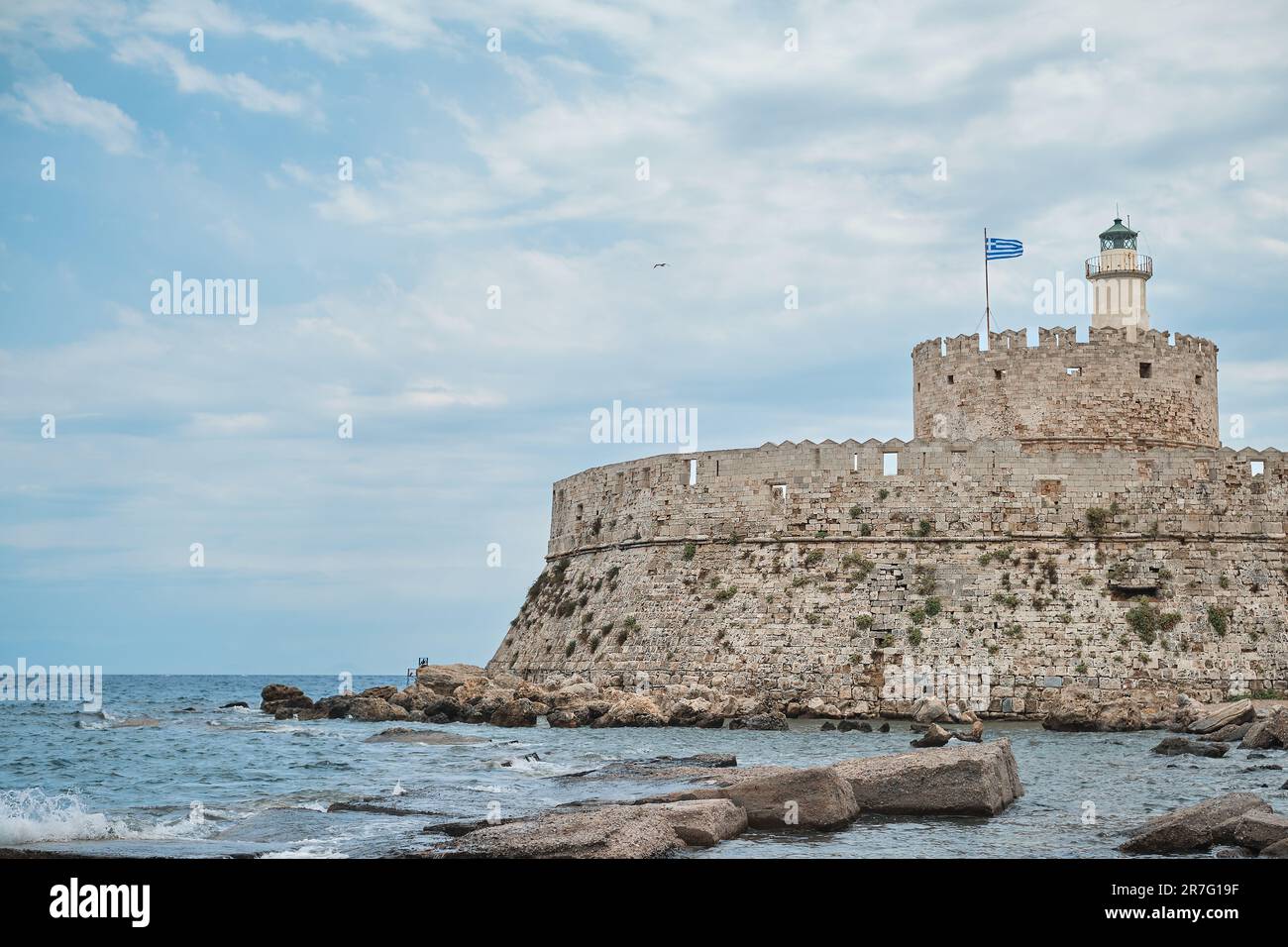 St. Nicholas Rhodes Tower, vertical shot, the plane comes in to land ...