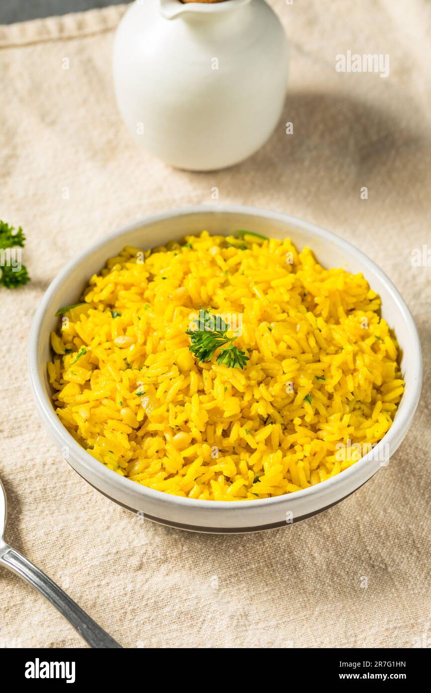 Homemade Yellow Mediterranean Rice with Pine Nuts Stock Photo - Alamy
