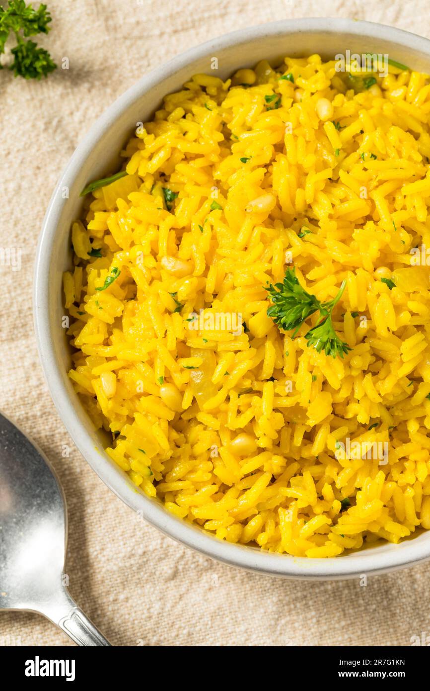 Homemade Yellow Mediterranean Rice with Pine Nuts Stock Photo - Alamy