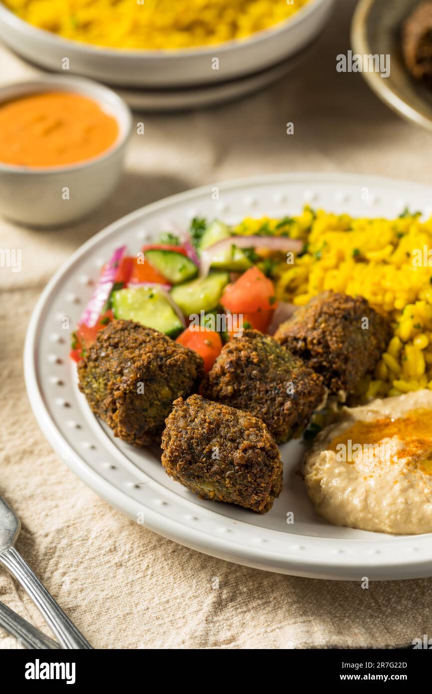 Homemade Mediterranean Falafel Plate with Rice and Hummus Stock Photo ...