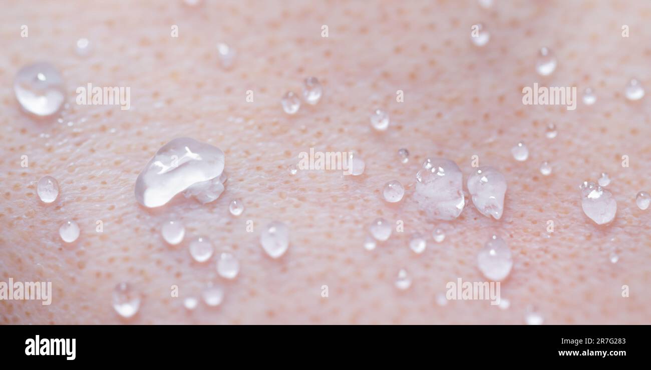 Splashing of Hyaluron gel. Liquid hyaluronic acid gel on macro ...