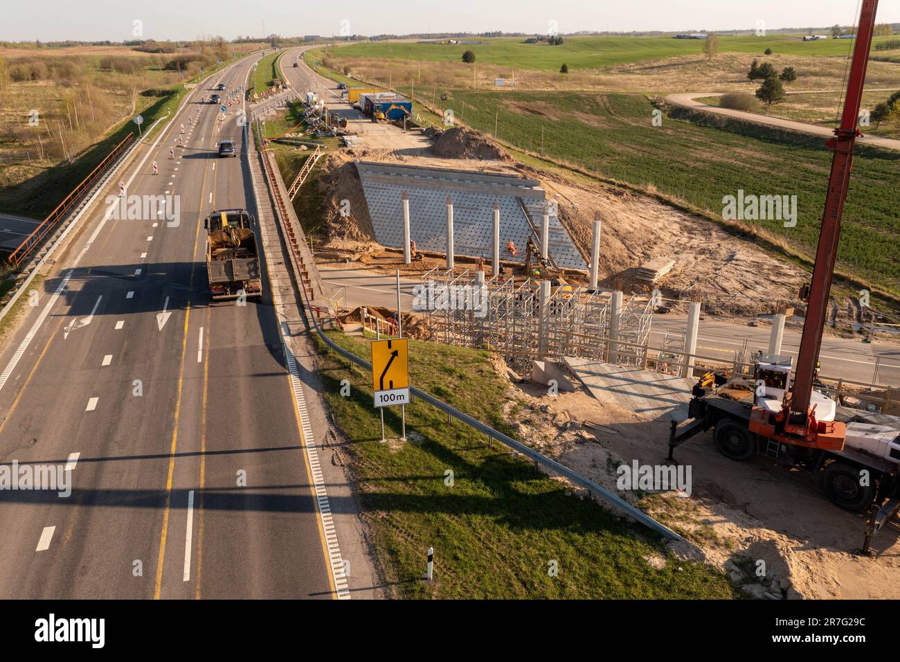Drone photography of highway bridge being built during spring day. High ...