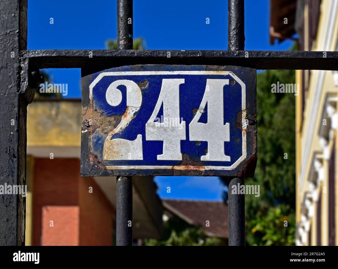 Street sign number 244 on a black grid Stock Photo - Alamy
