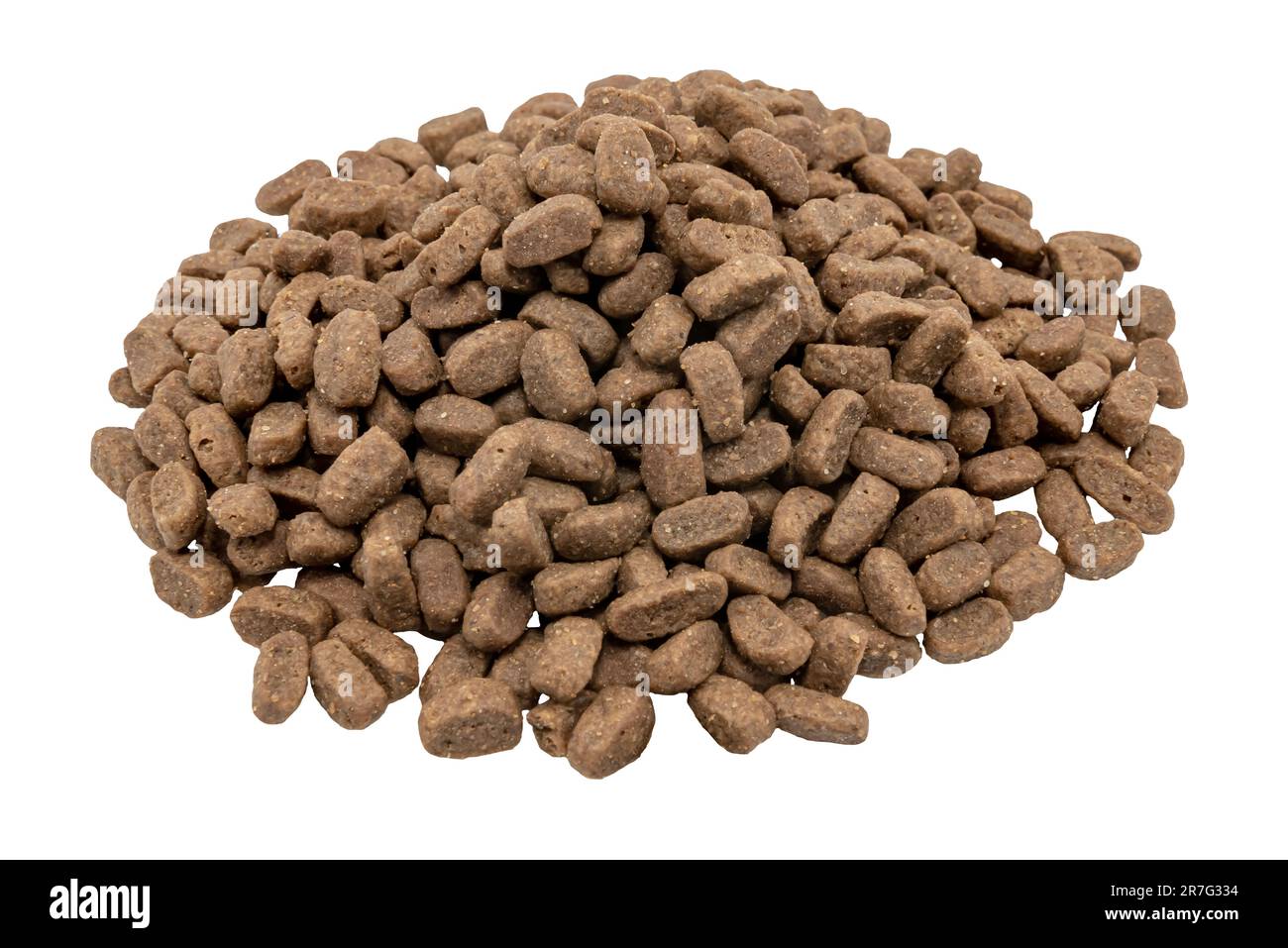 A slide of dry dog food on a white background. Food for dogs and cats ...