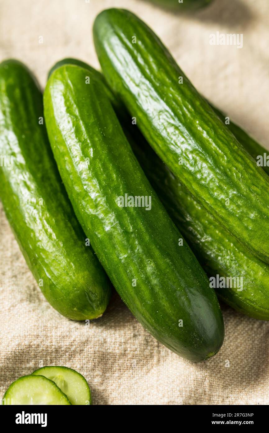 Green Raw Organic Mini Baby Cucumbers Ready to Eat Stock Photo - Alamy