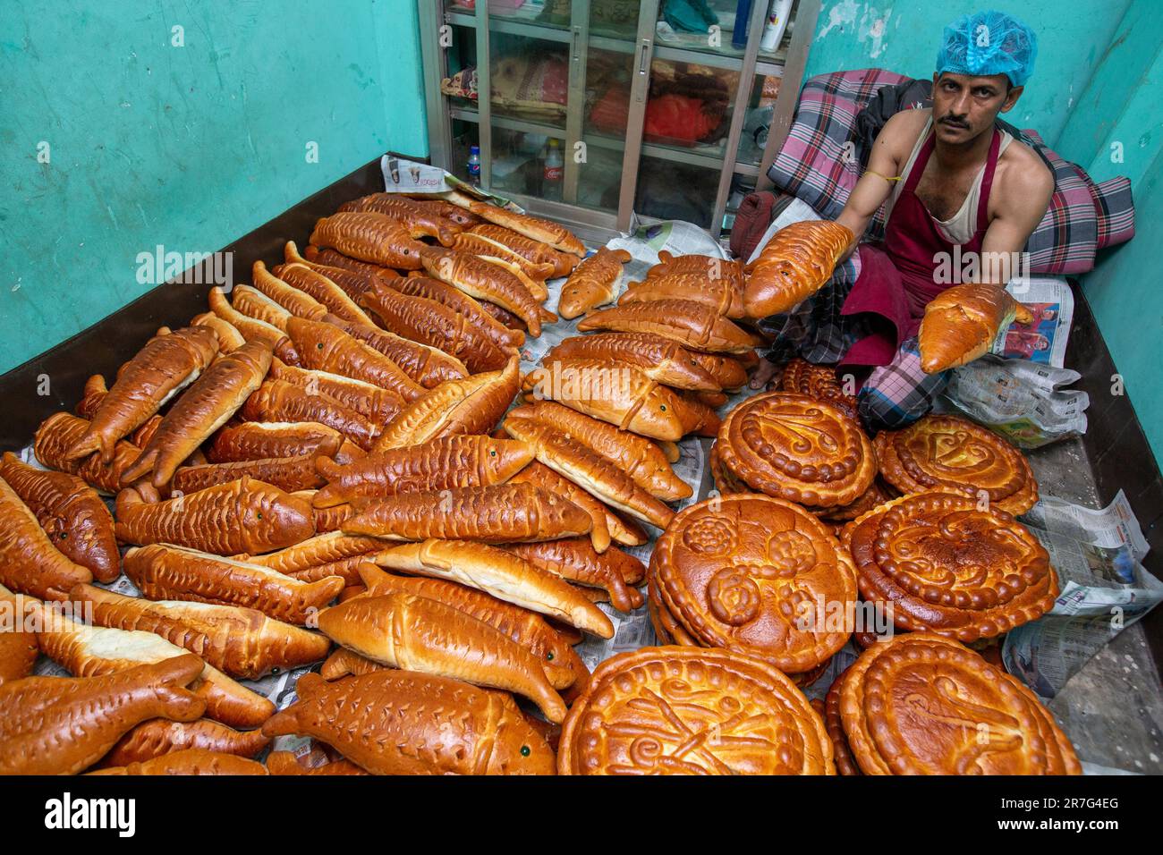 Breads of different sizes and shapes have been made on the occasion of ...