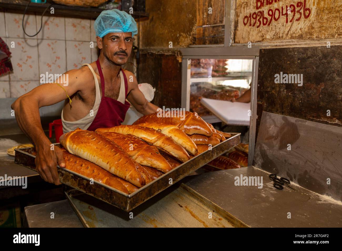 Breads of different sizes and shapes have been made on the occasion of ...