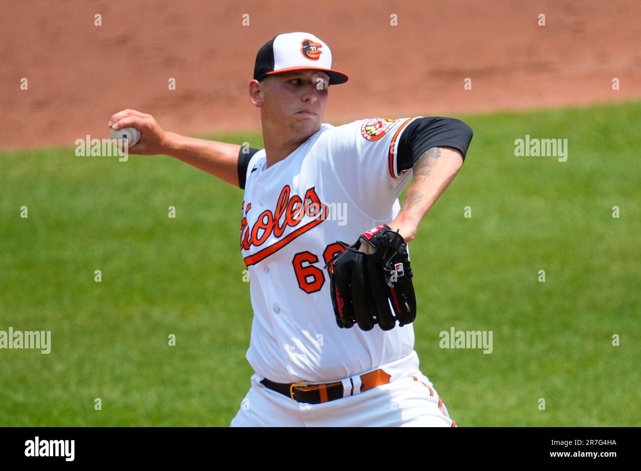 Baltimore Orioles starting pitcher Tyler Wells throws a pitch to the ...