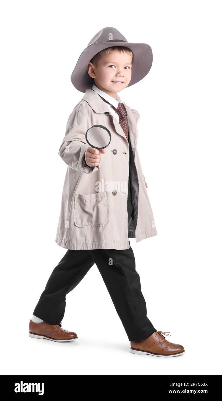 Cute little detective with magnifier on white background Stock Photo ...