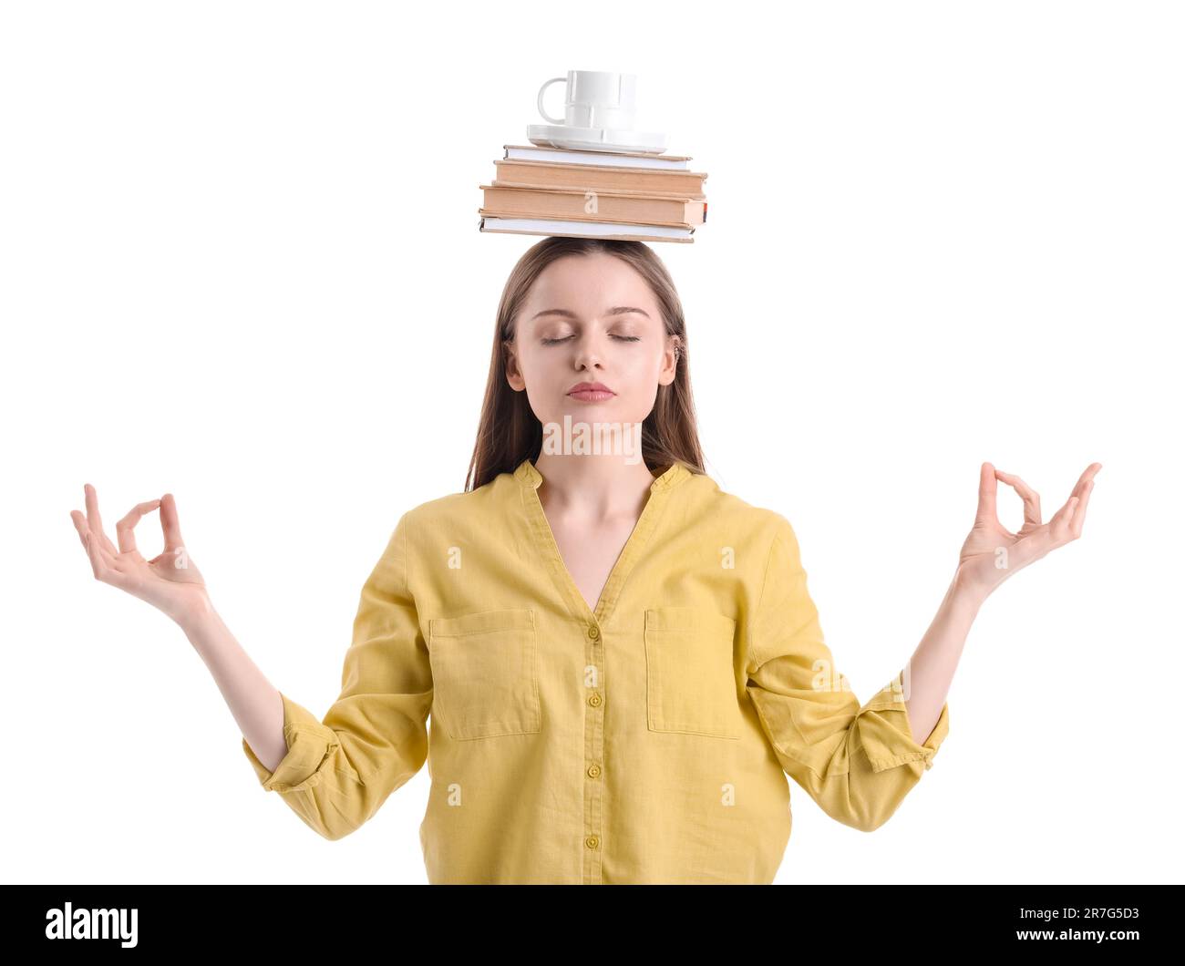 Woman balancing books head hi-res stock photography and images - Alamy