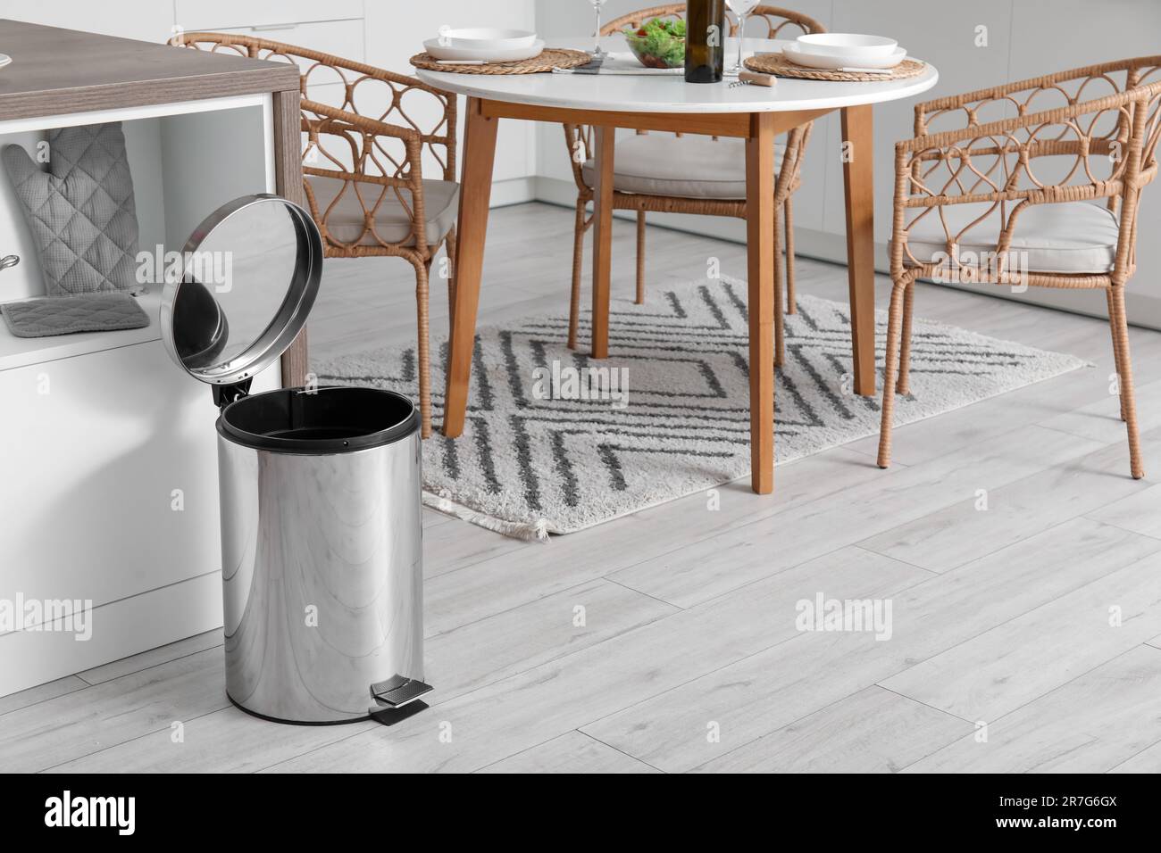 Opened metallic trash bin in interior of modern kitchen Stock Photo - Alamy